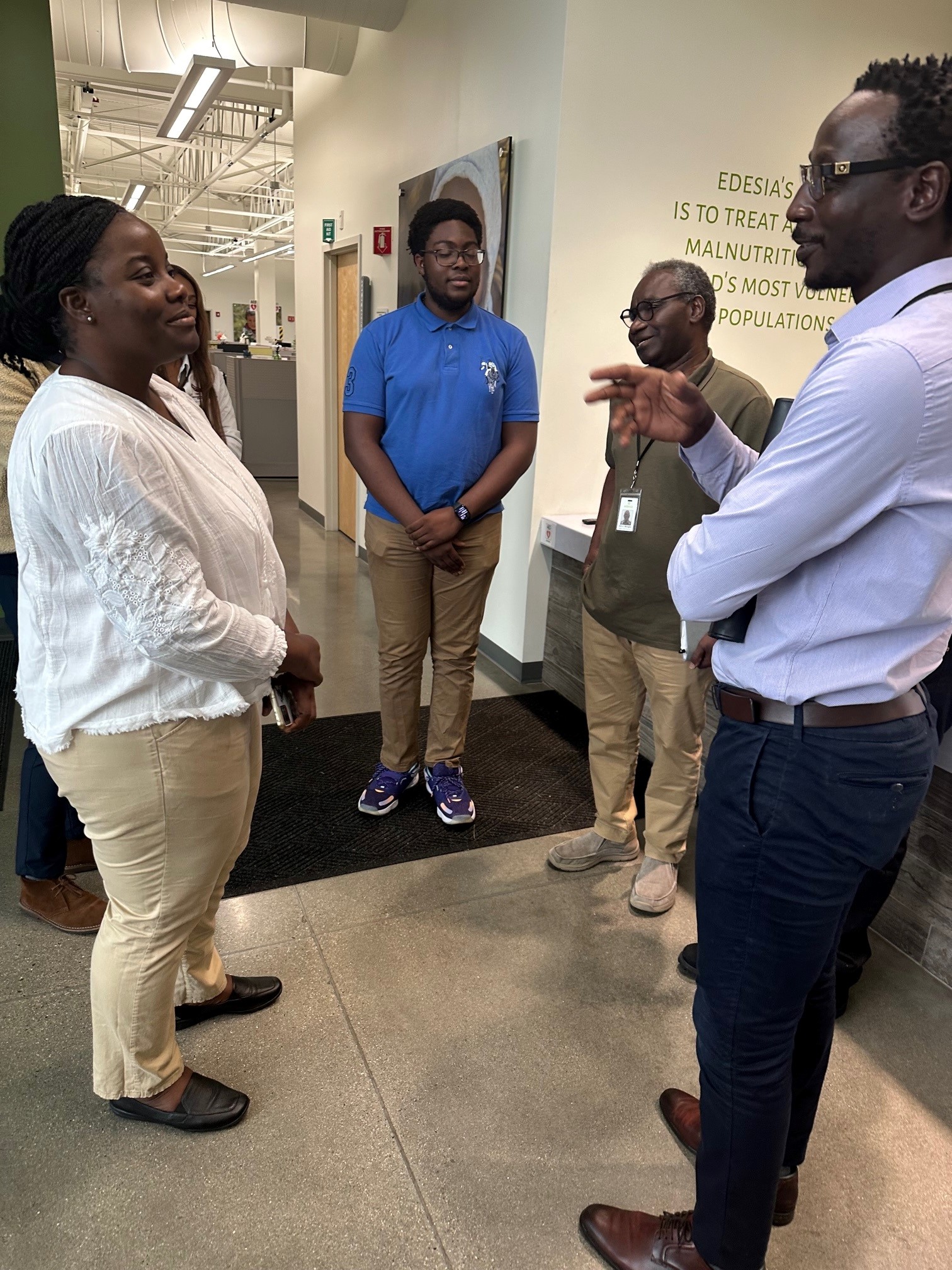 WISHH Facilitates Partner Tour of Edesia Nutrition - WISHH